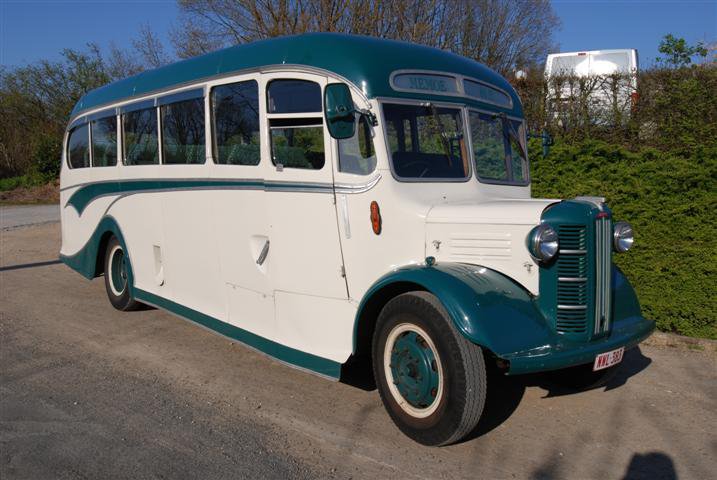 The Diligence Company | Verhuur groene Austin bus